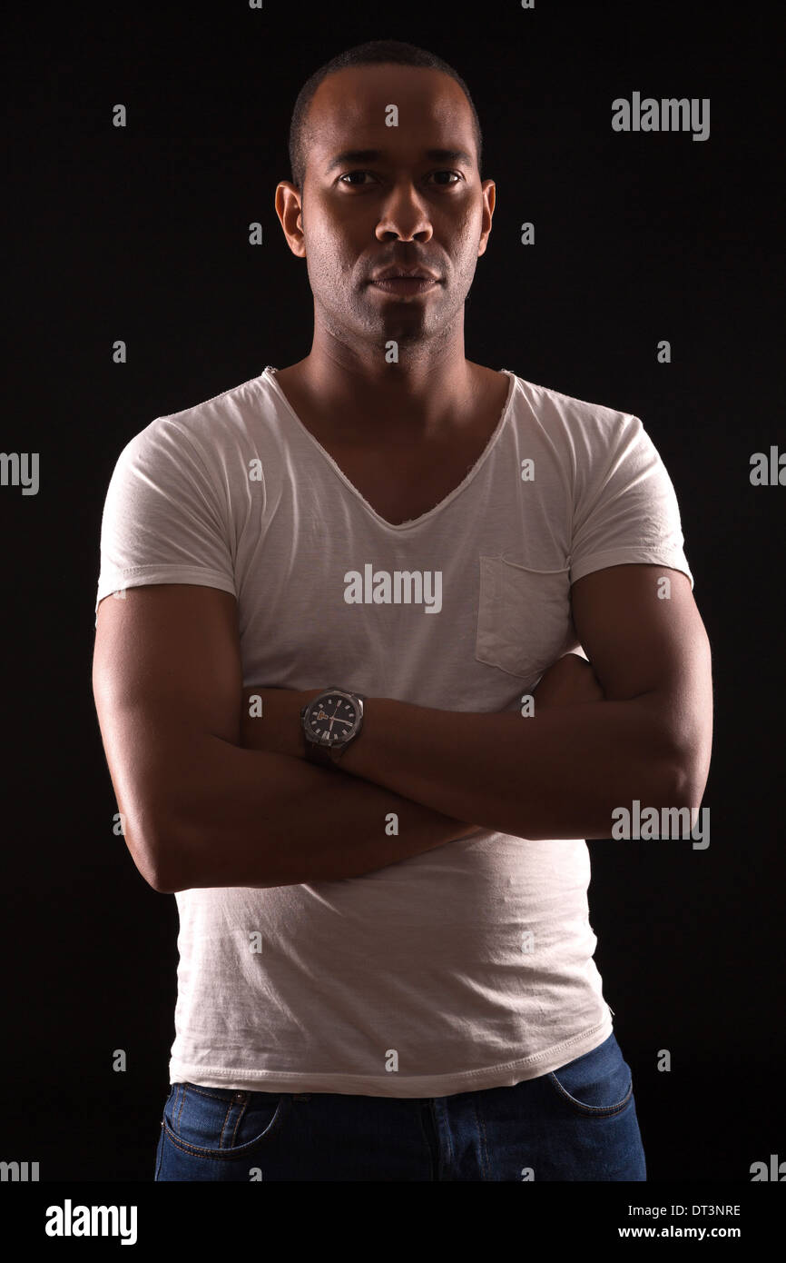 Young and beautiful african man posing isolated Stock Photo - Alamy