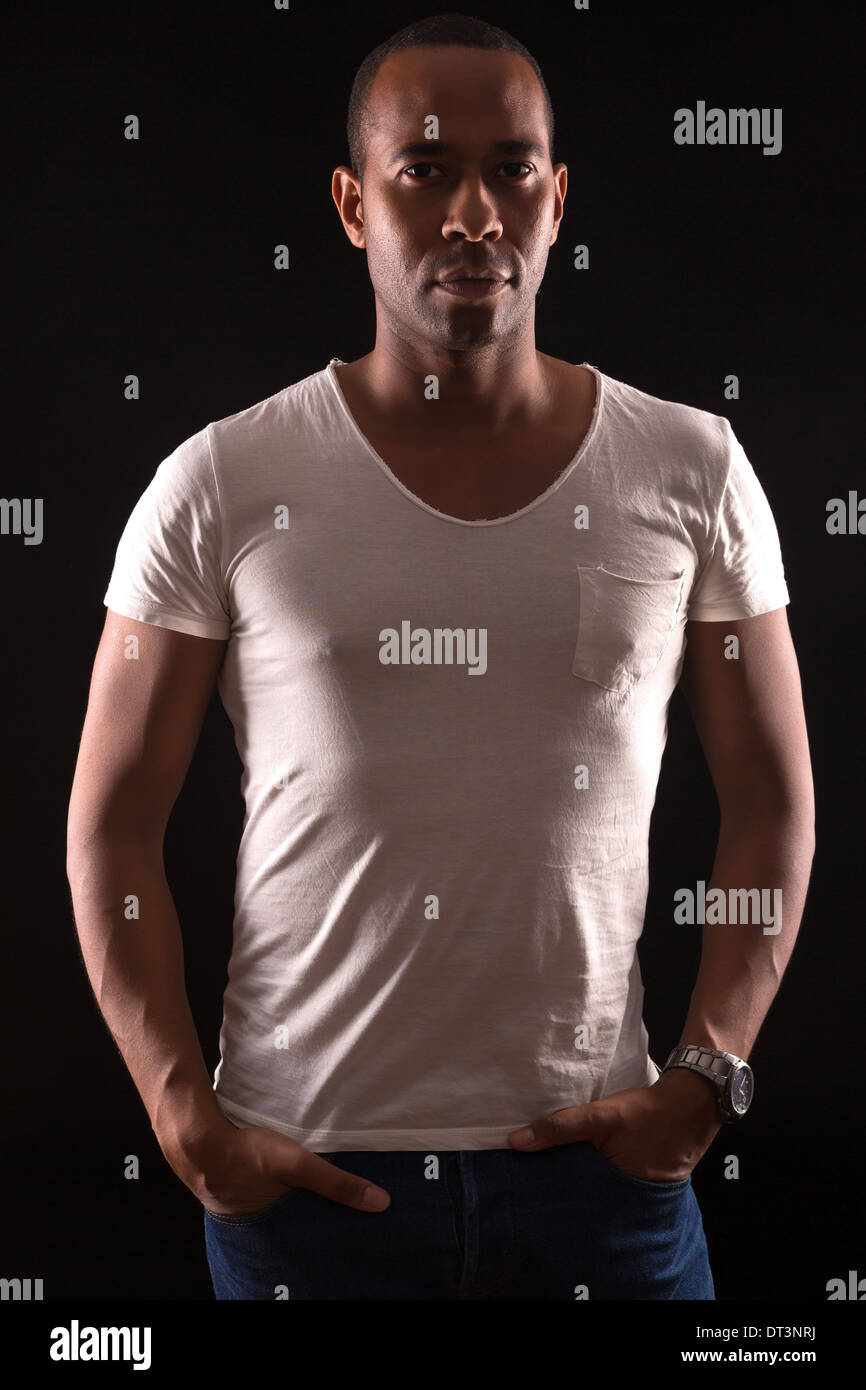 Young and beautiful african man posing isolated Stock Photo - Alamy