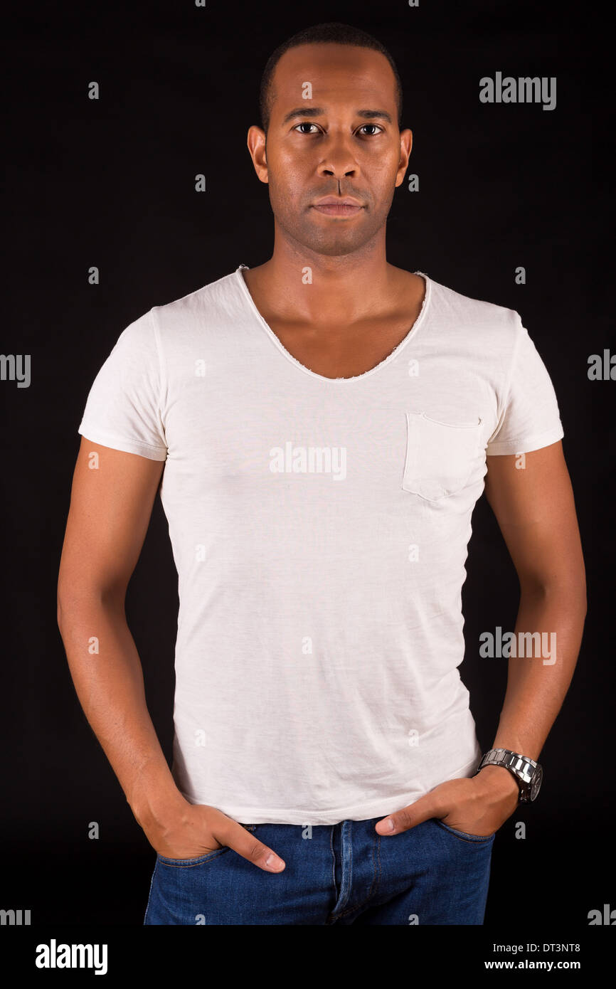 Young and beautiful african man posing isolated Stock Photo - Alamy