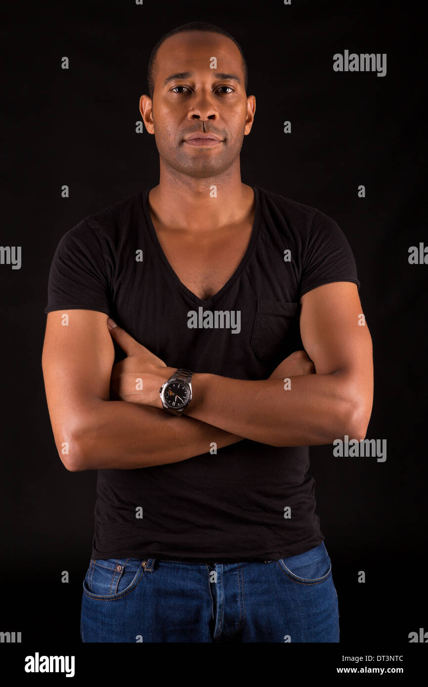 Young and beautiful african man posing isolated Stock Photo - Alamy