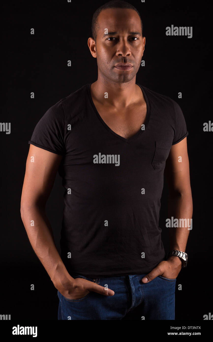 Young and beautiful african man posing isolated Stock Photo - Alamy