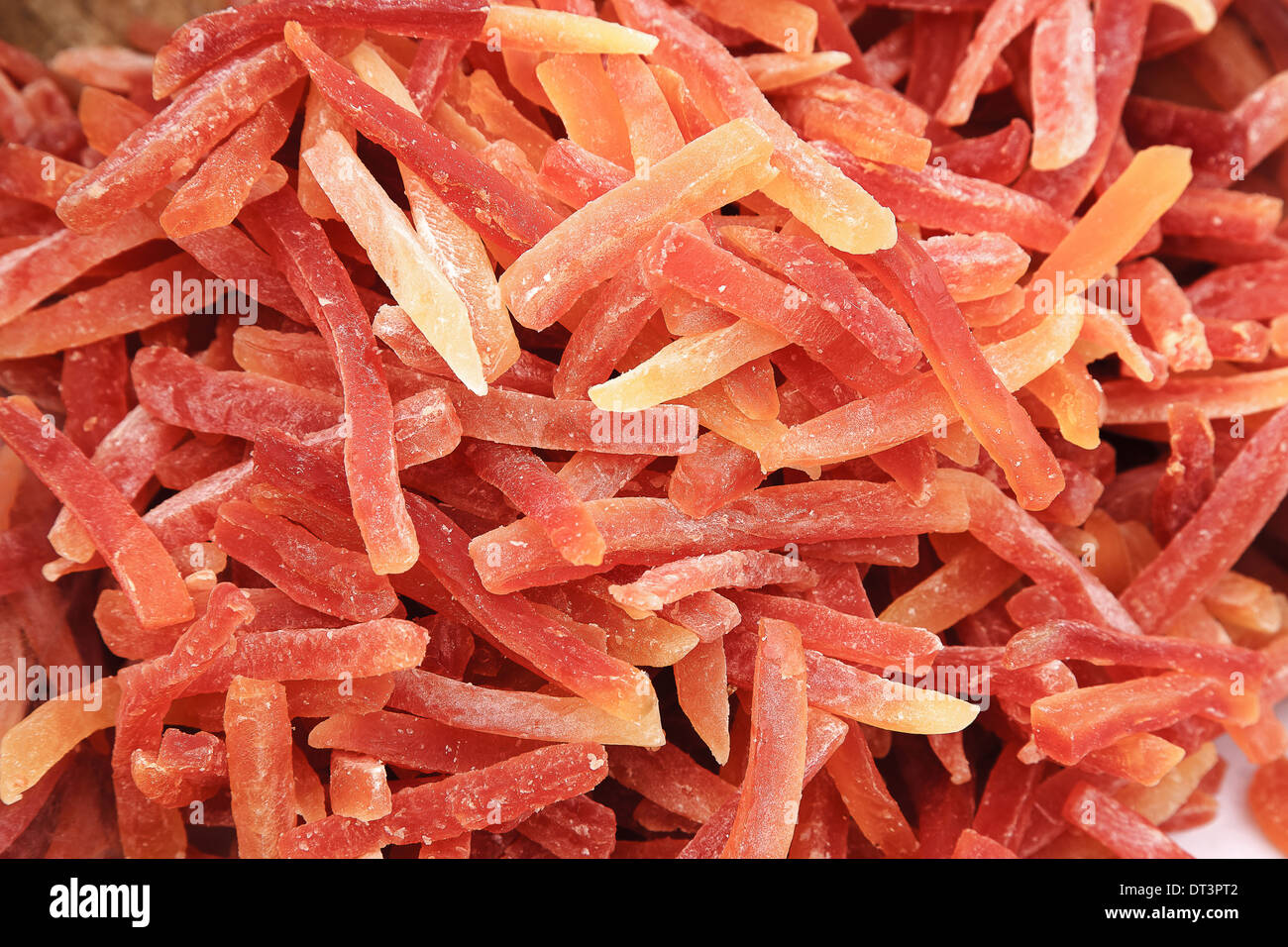 Dried slice pieces of ripe papaya isolated Stock Photo - Alamy