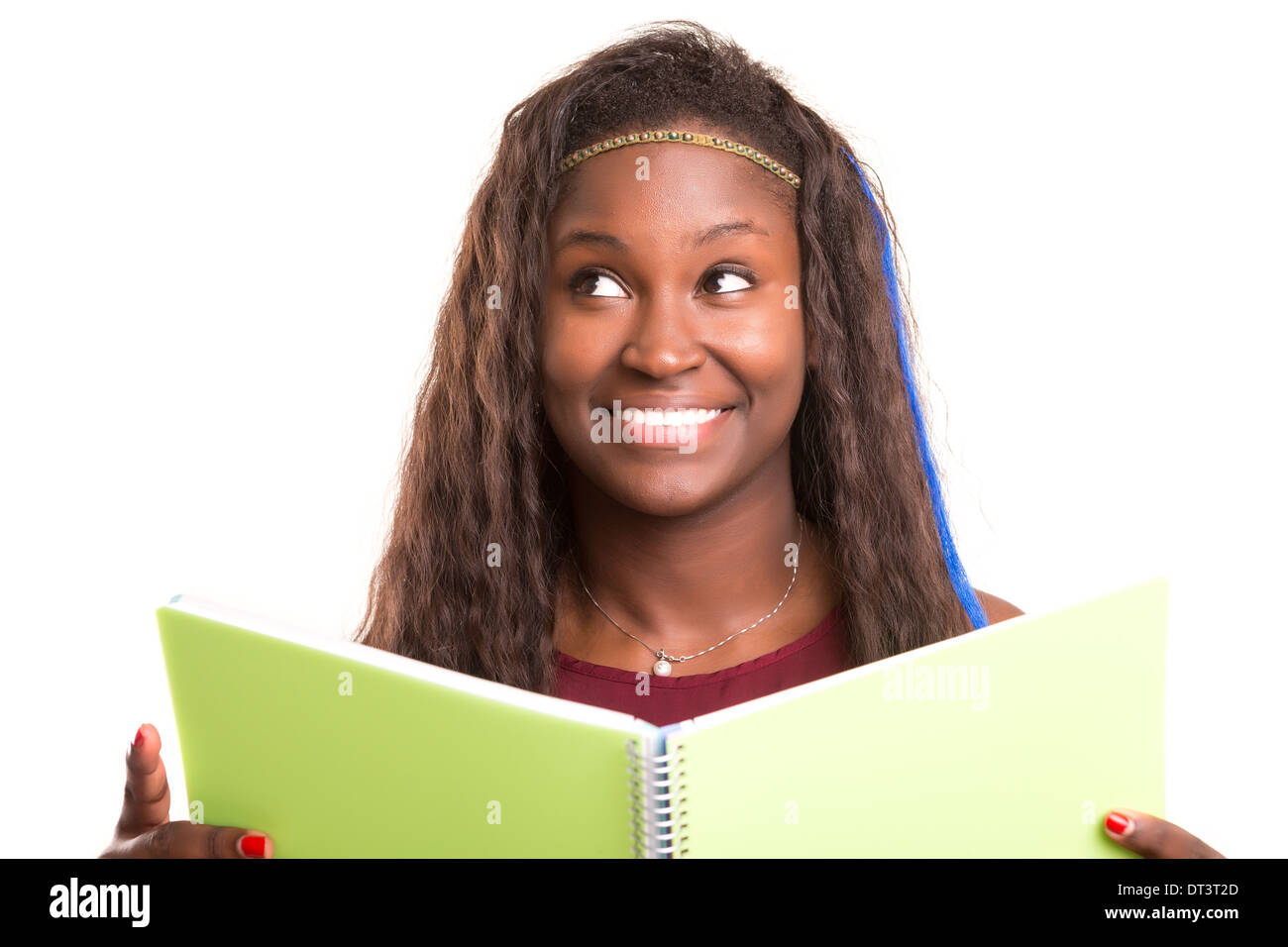 Beautiful african student woman posing isolated over white background ...