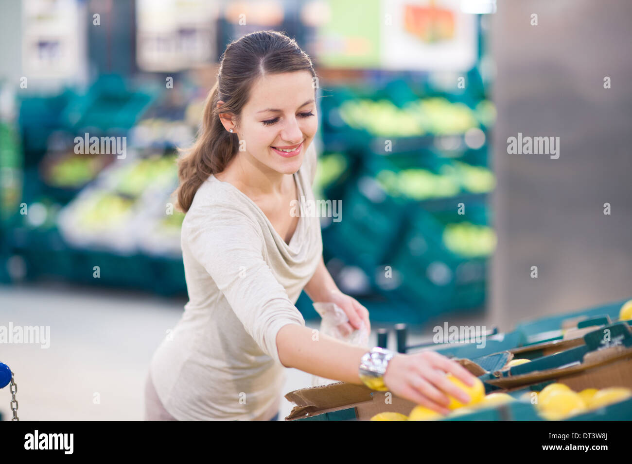 Beautiful young woman shopping in a grocery store/supermarket Stock ...