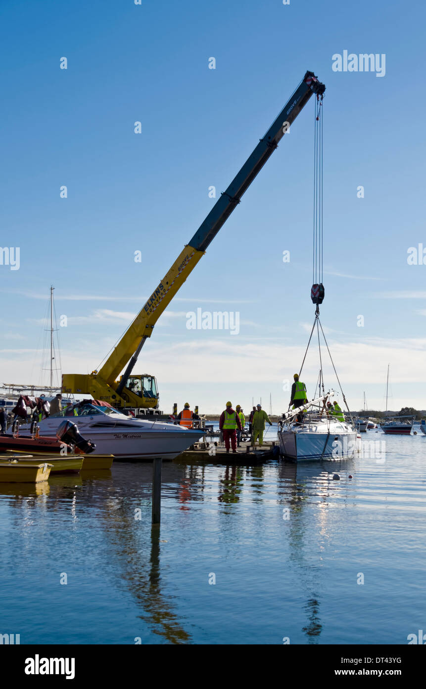 Boat hoist lifting yacht out of water hi-res stock photography and ...