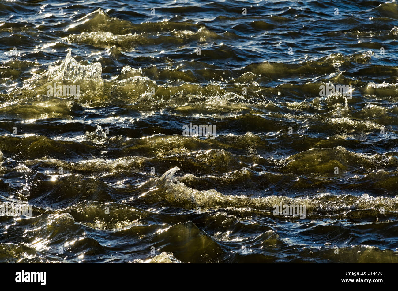 back-light breaking waves choppy water Stock Photo - Alamy