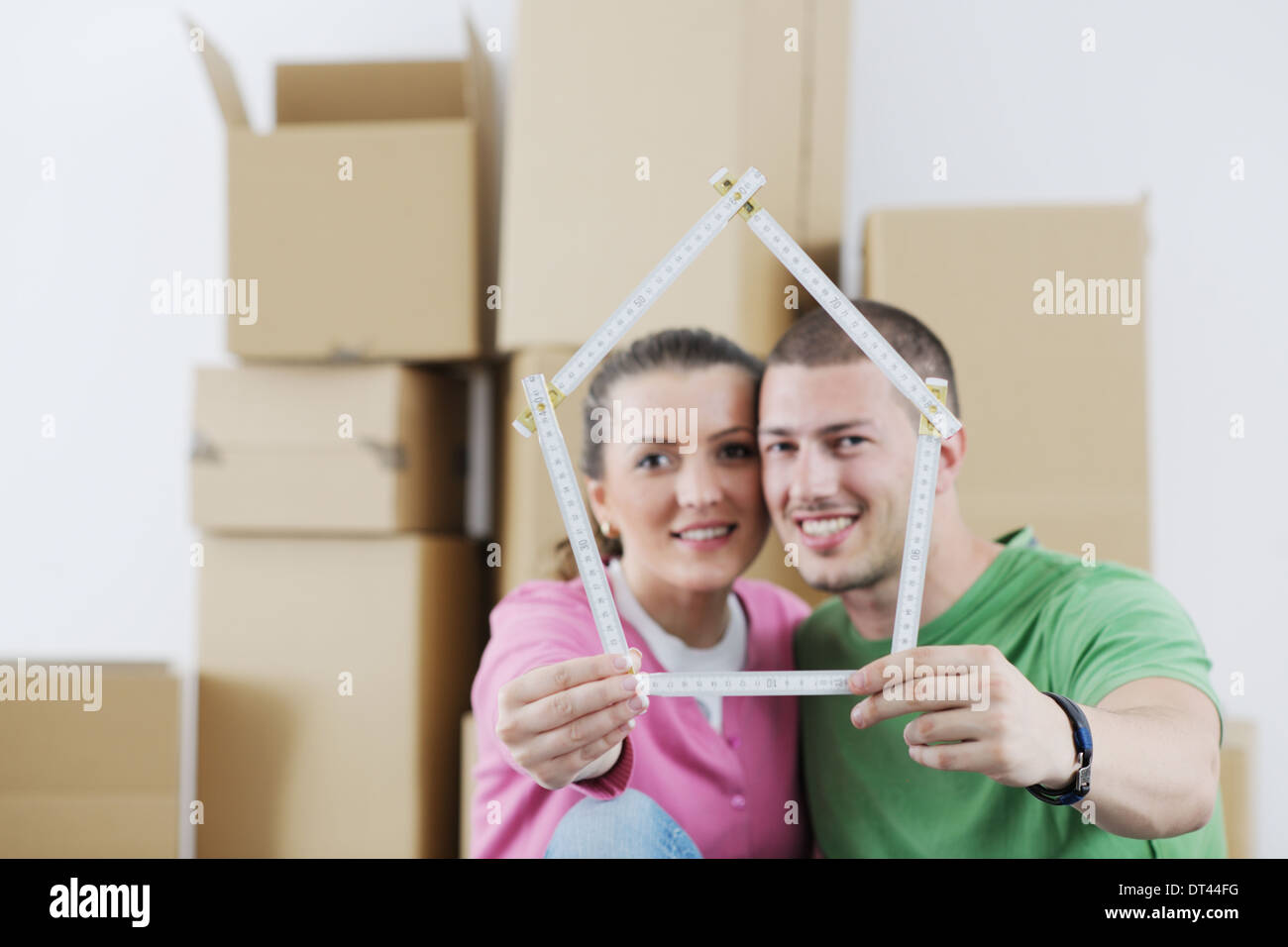 Young couple moving in new house Stock Photo - Alamy