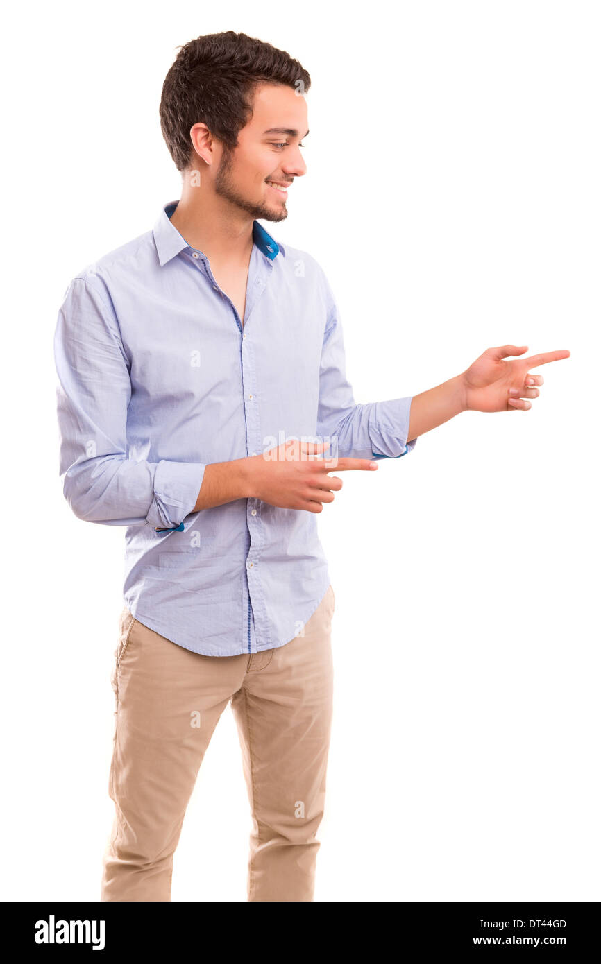 Young man presenting your product, isolated over a white background ...