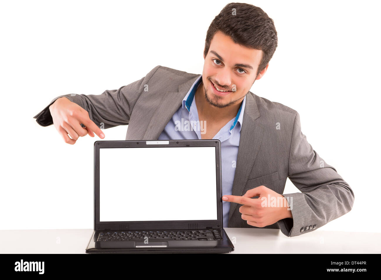 Young man presenting your product in a laptop computer Stock Photo - Alamy