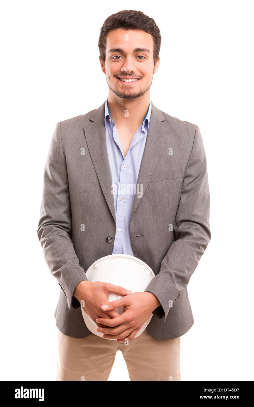 Handsome young engineer posing isolated over white background Stock ...