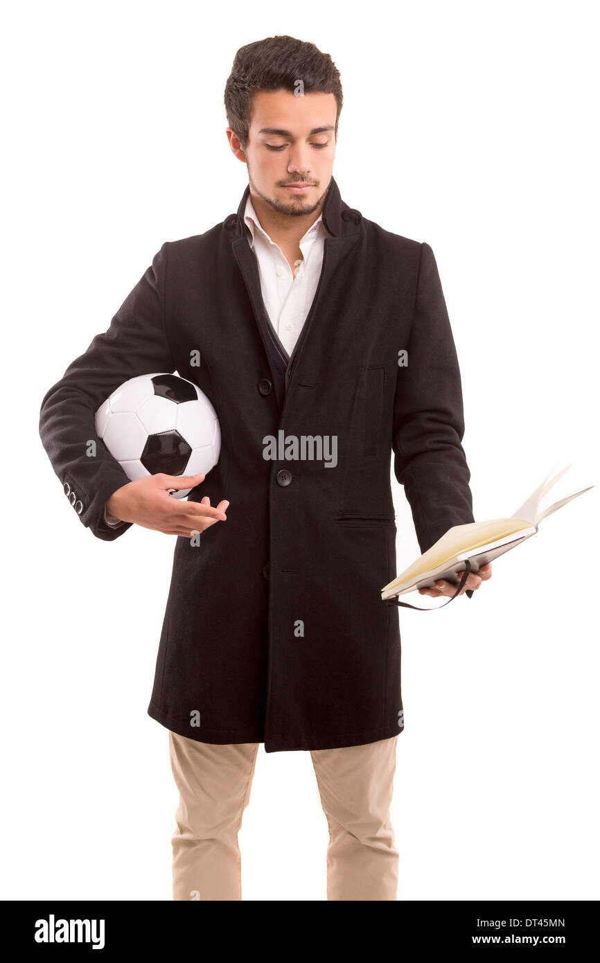Studio picture of a handsome young football coach Stock Photo - Alamy