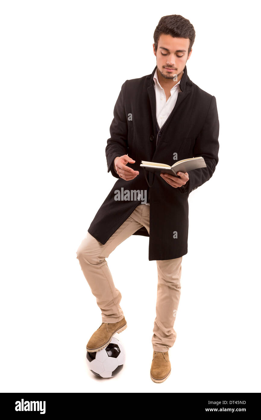 Studio picture of a handsome young football coach Stock Photo - Alamy