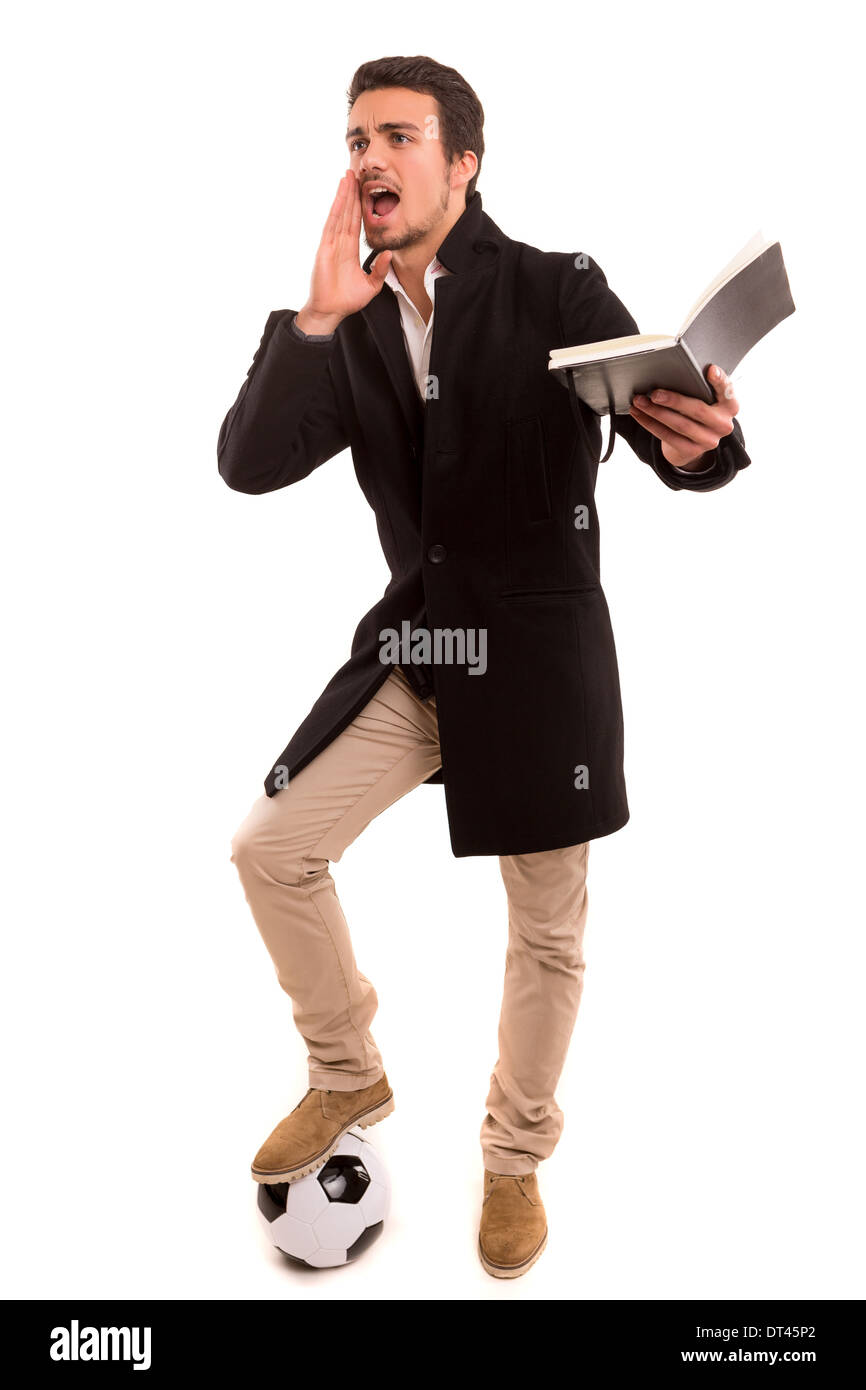 Studio picture of a handsome young football coach Stock Photo - Alamy