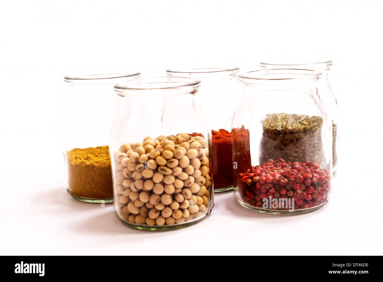 Variety of spices in a glass pot Stock Photo - Alamy