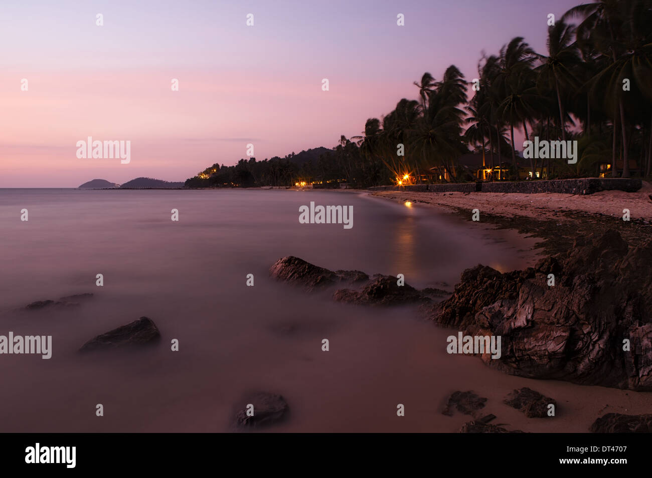 Sunset at tropical beach Stock Photo - Alamy