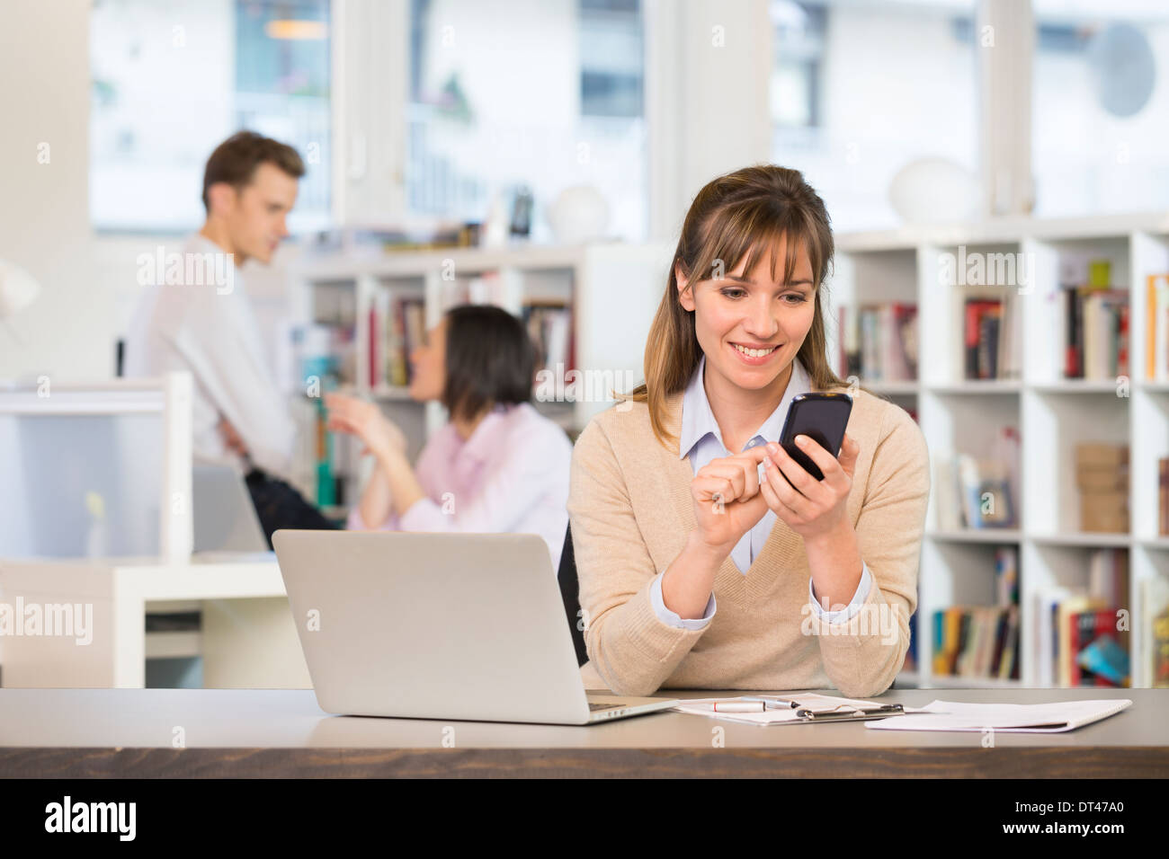 Typing female office worker hi-res stock photography and images - Alamy