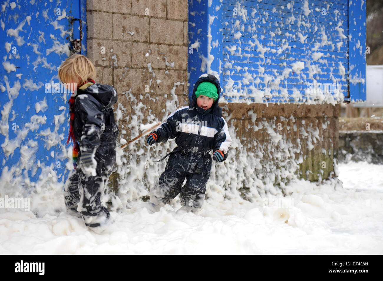 Caswell Bay, Swansea, UK. 8th Feb 2014. Perrin Jones and his friend ...