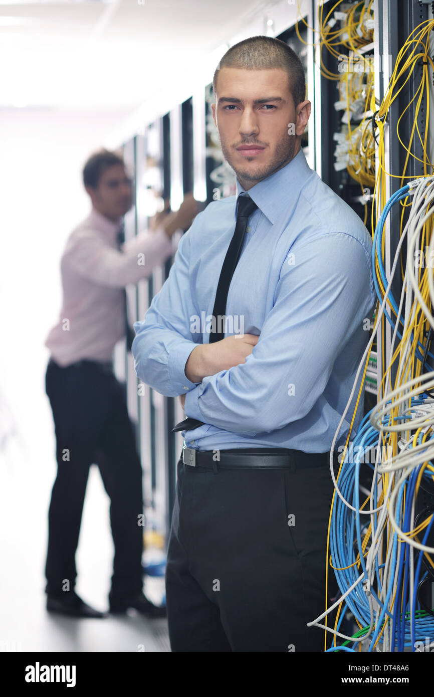 it engineers in network server room Stock Photo - Alamy