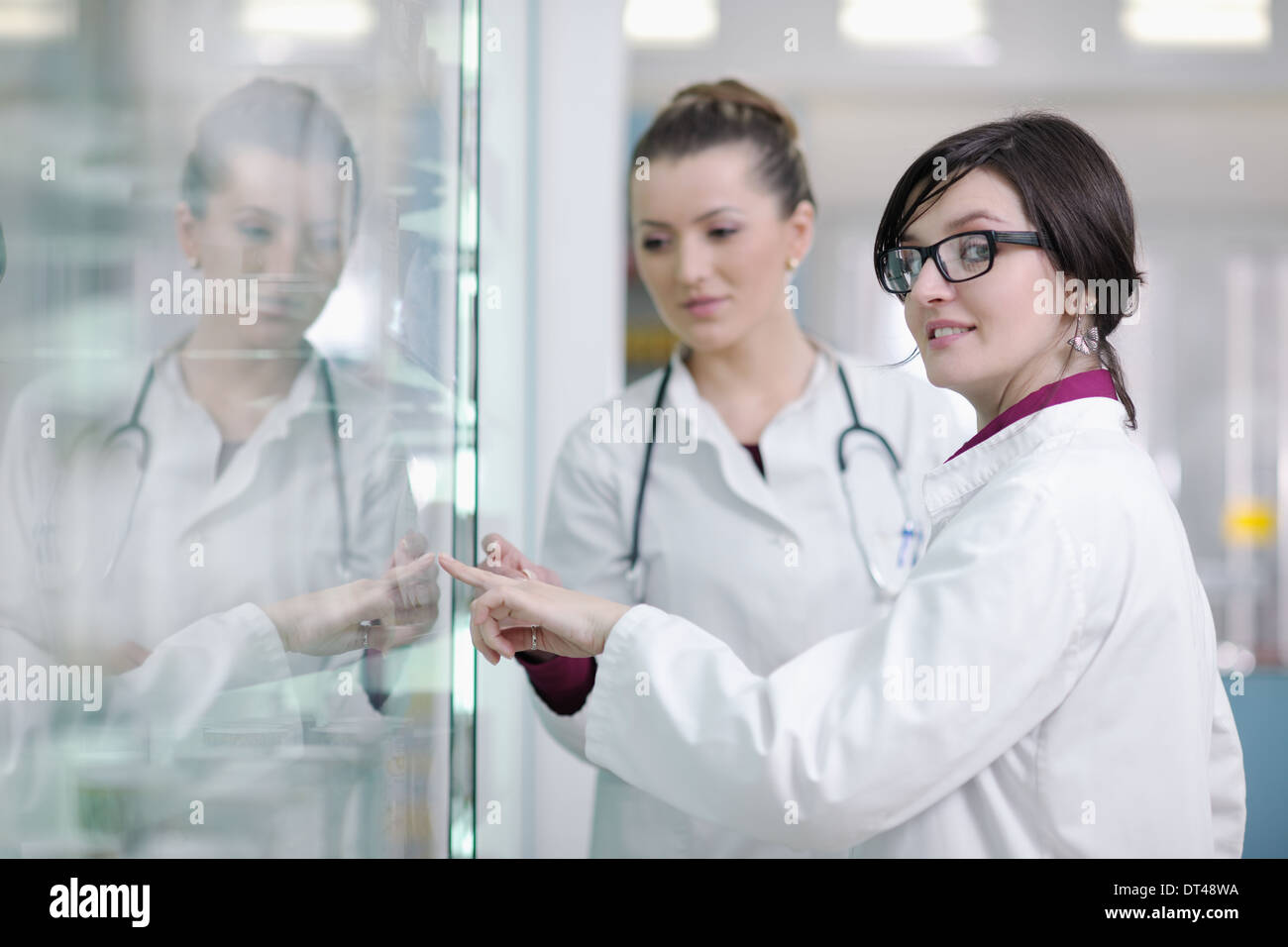 team of pharmacist chemist woman in pharmacy drugstore Stock Photo - Alamy