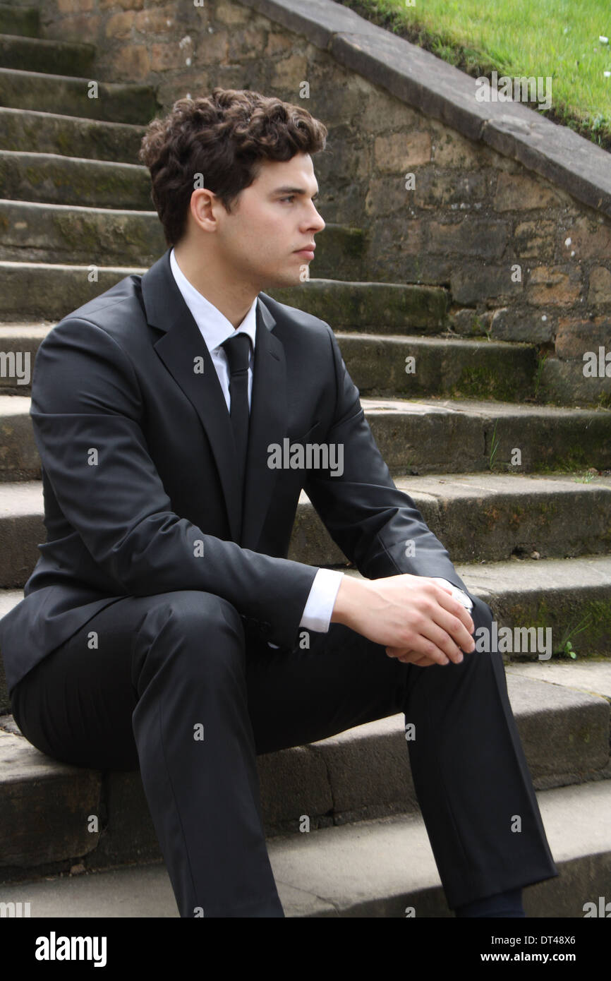 A male model in a suit Stock Photo - Alamy