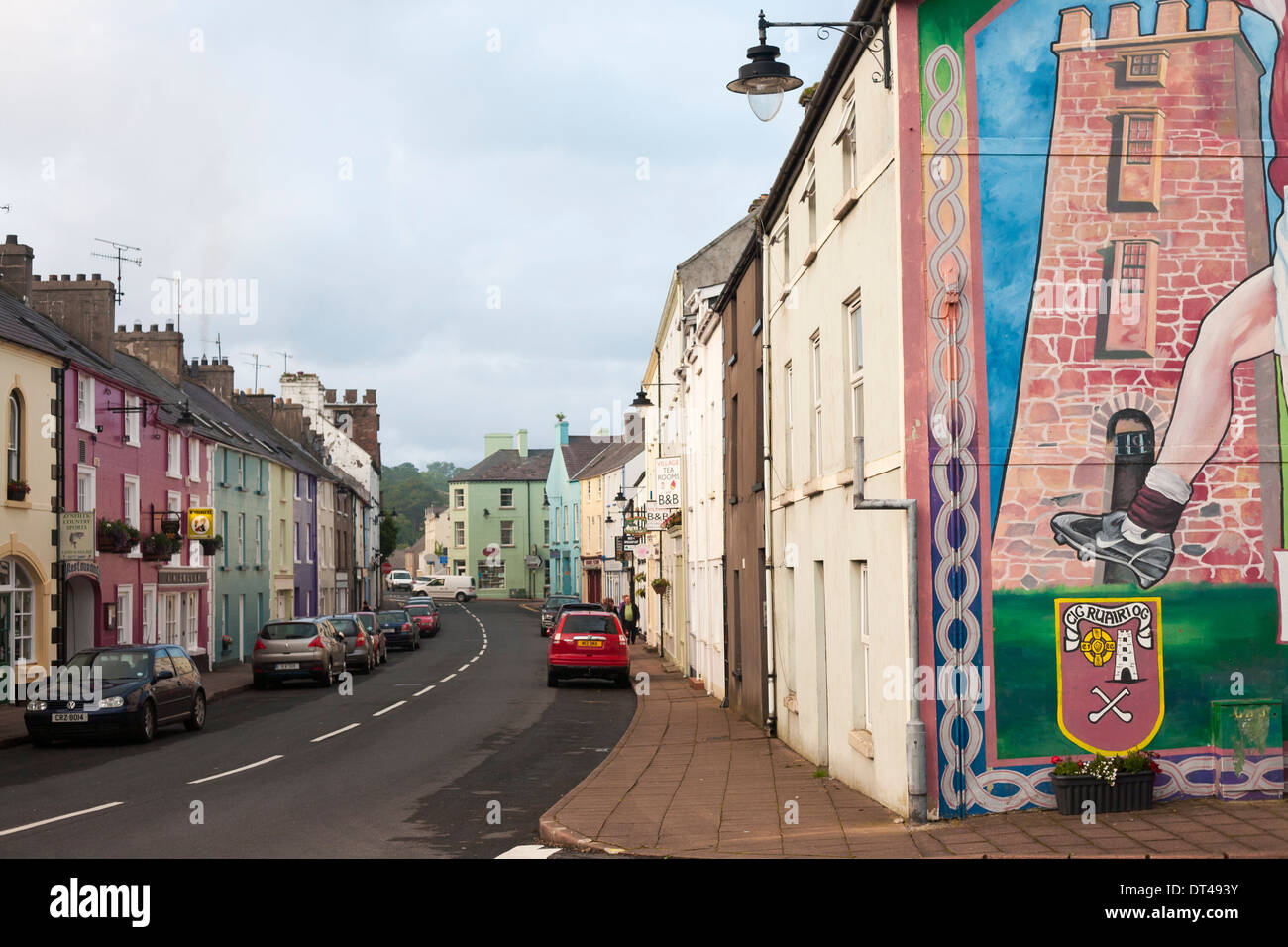 Colourful houses in rural Northern Ireland with murals on the sides of ...