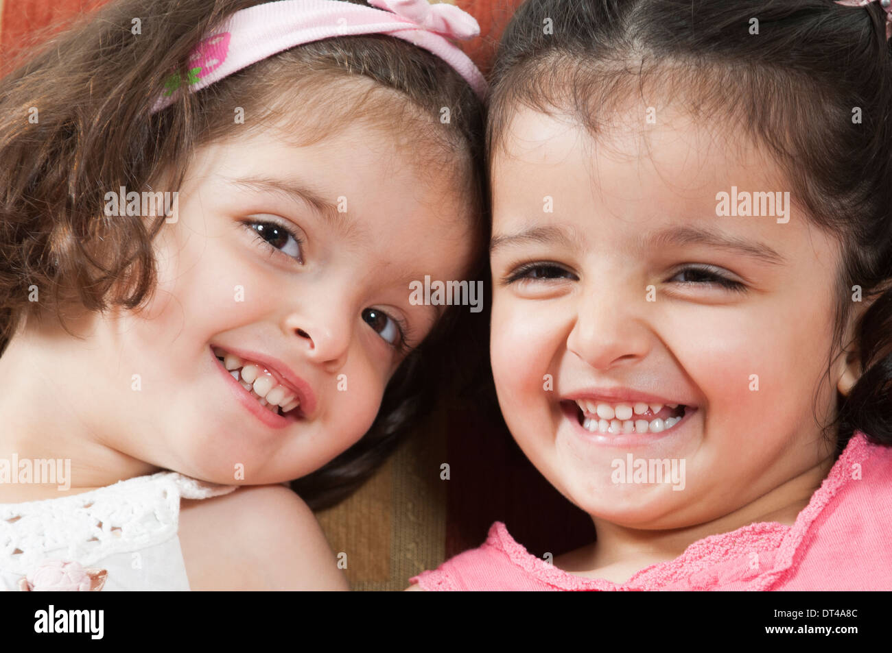 Faces of twin sisters hi-res stock photography and images - Alamy
