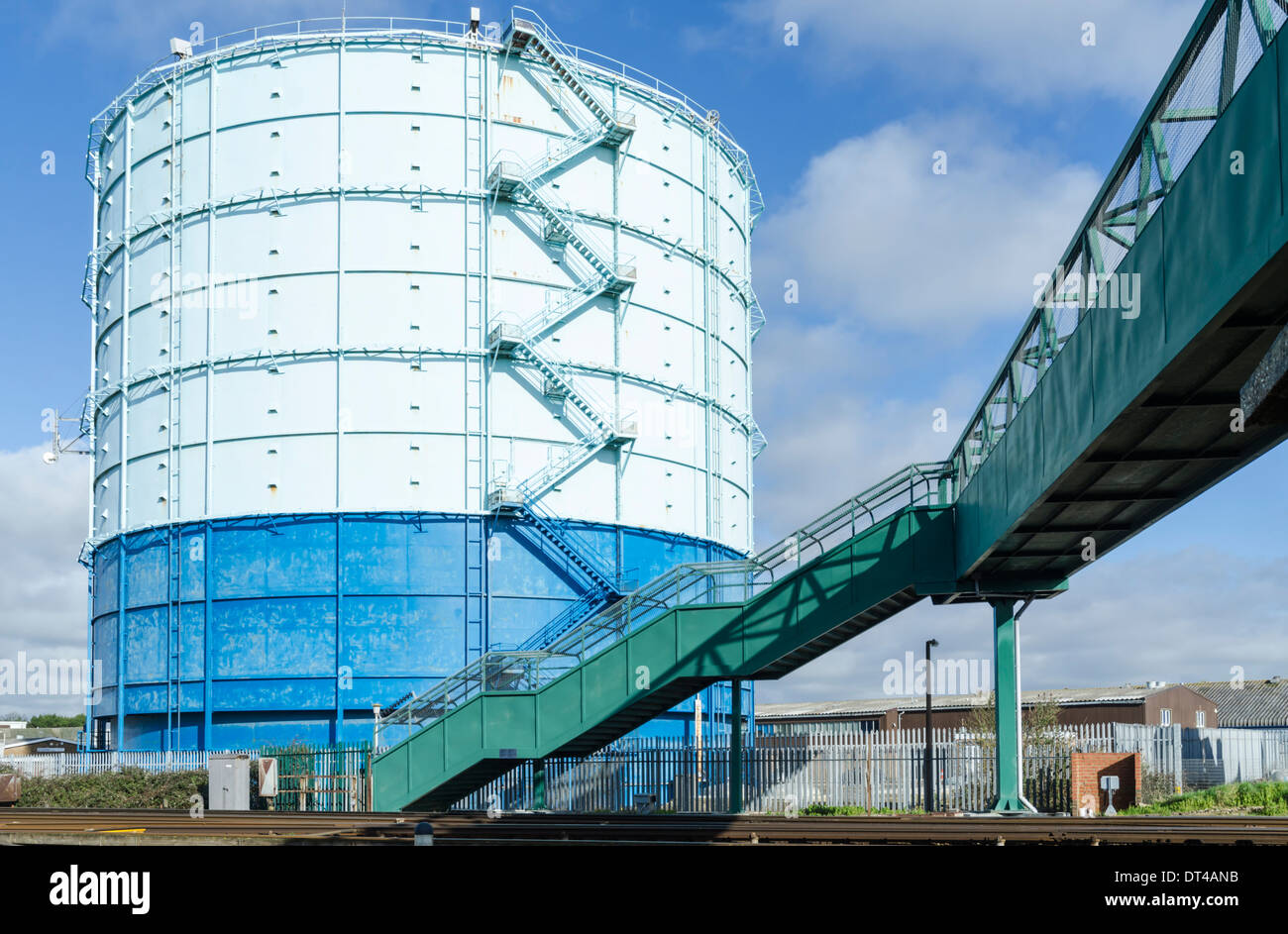 Gasometer next to a railway footbridge.in Littlehampton, West Sussex ...