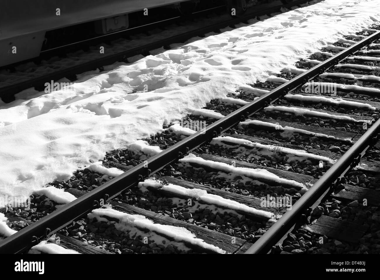 Railway line in snow Black and White Stock Photos & Images - Alamy