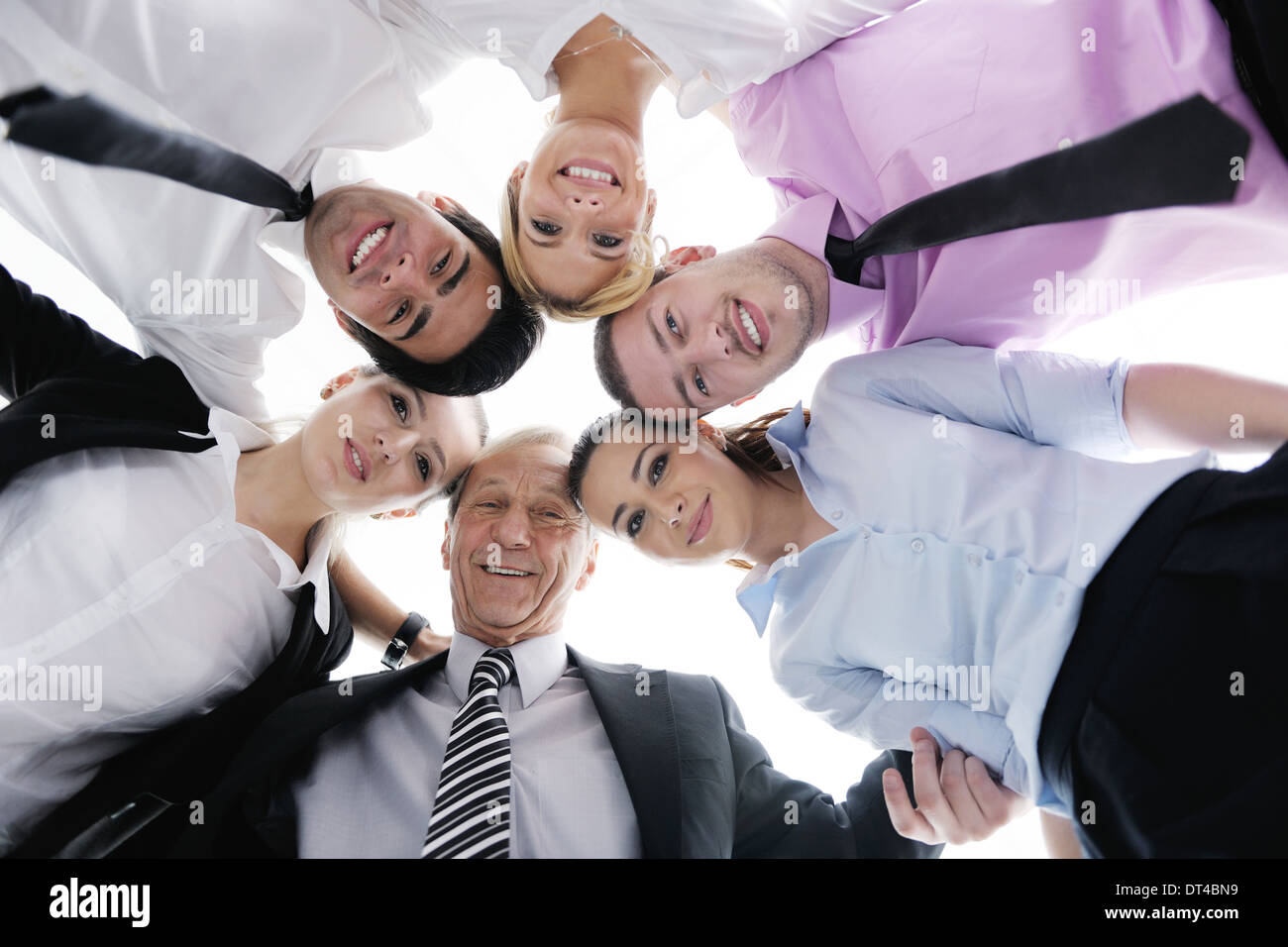 Heads together white background hi-res stock photography and images - Alamy