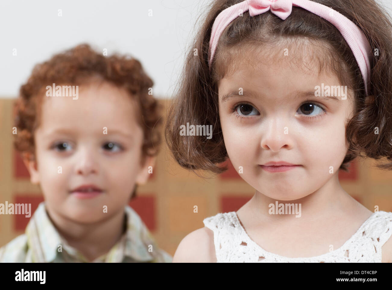 Brother and sister looking away Stock Photo - Alamy