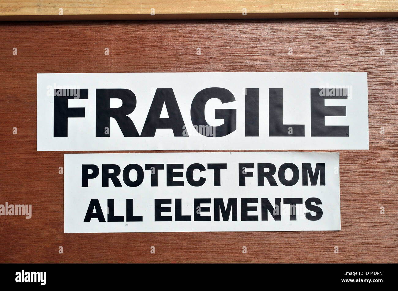 Notice on a packing case: Fragile - Protect from all elements Stock ...