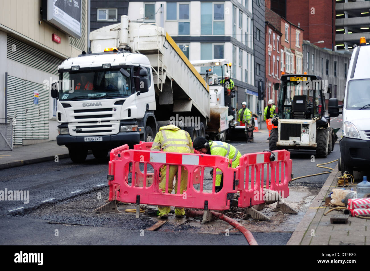 Road Works,Repairing Burst Water Pipe And Laying New Road Surface ...