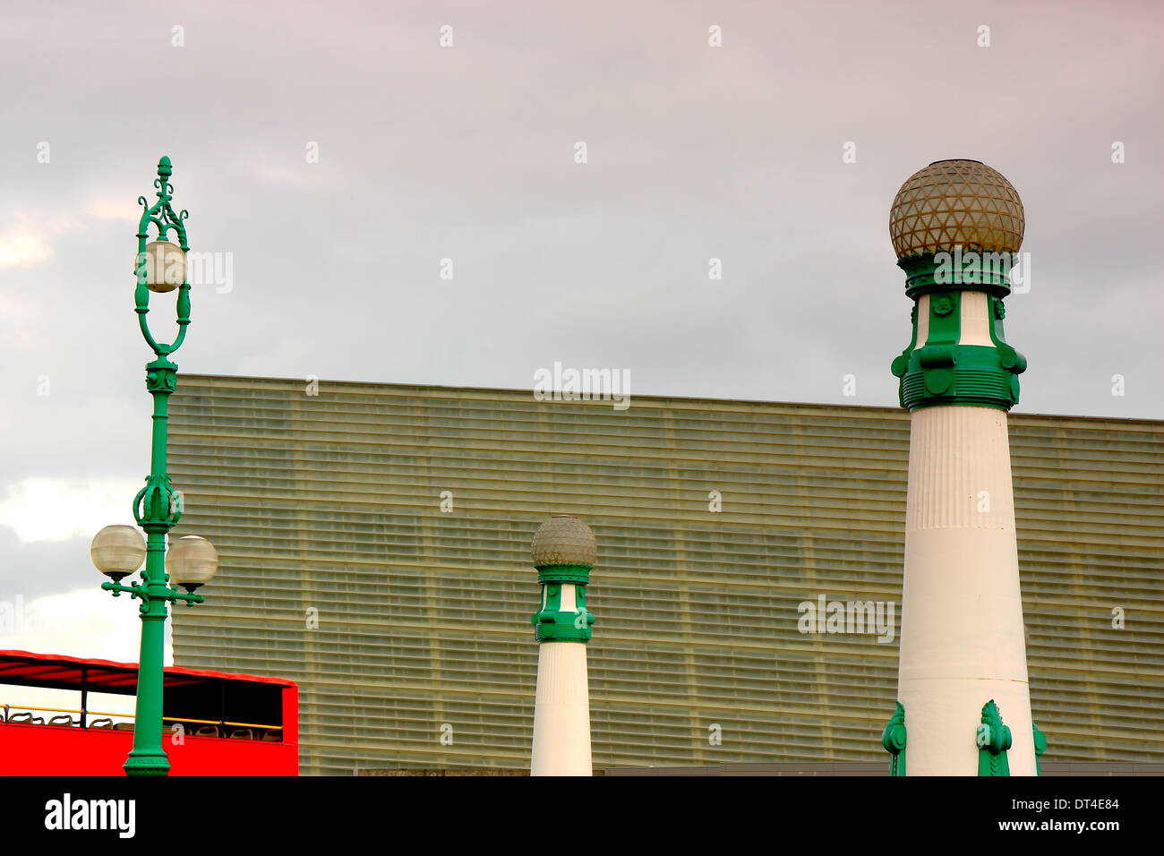 Red bus and lamp post Stock Photo - Alamy