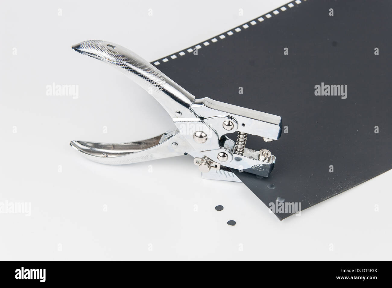 Office Puncher Unit isolated on white background Stock Photo - Alamy