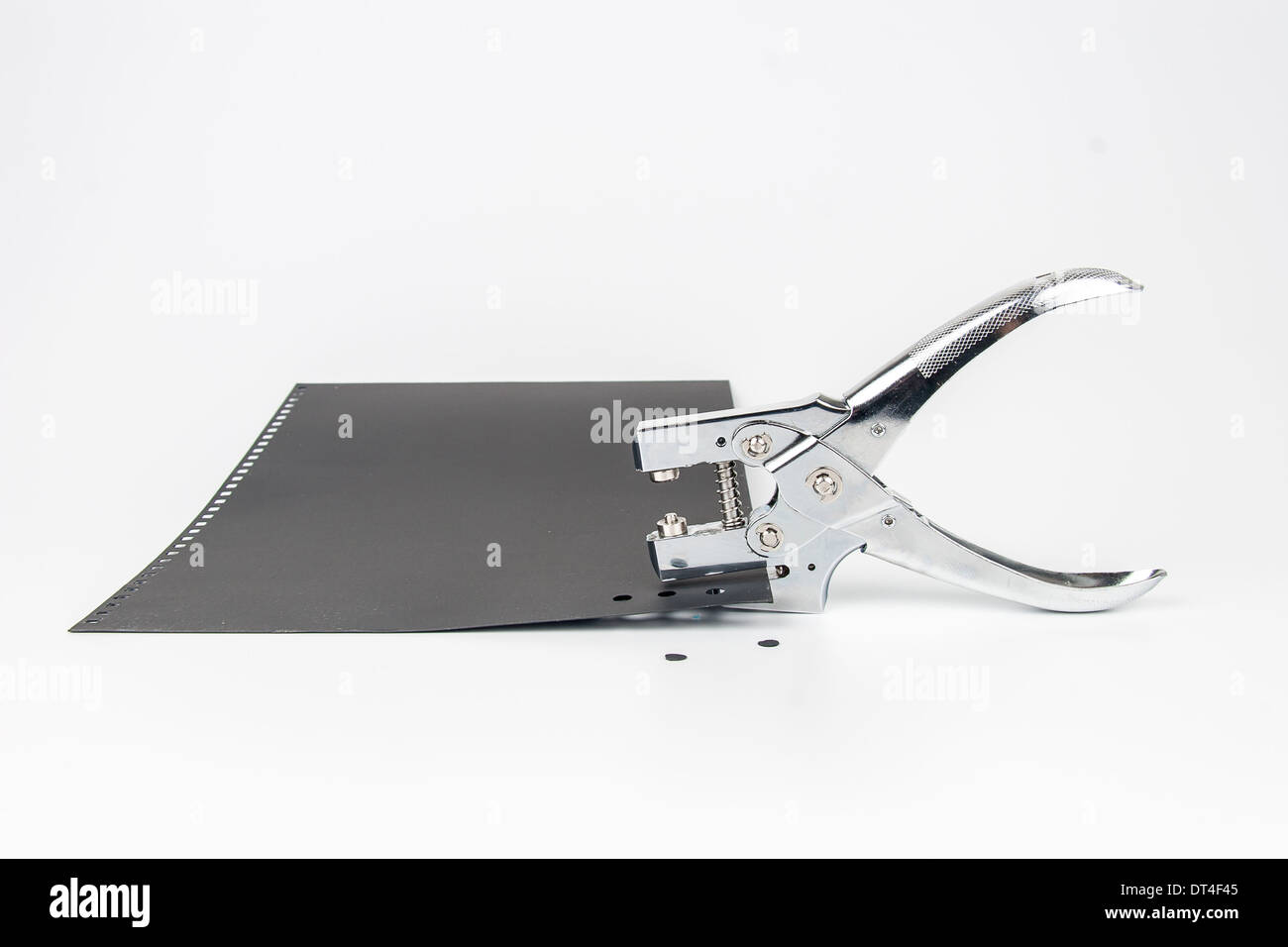 Office Puncher Unit isolated on white background Stock Photo - Alamy