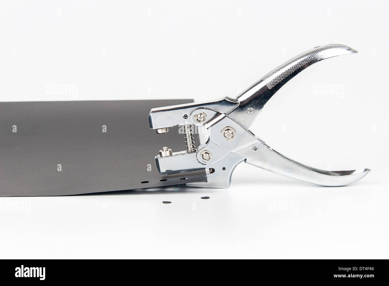 Office Puncher Unit isolated on white background Stock Photo - Alamy