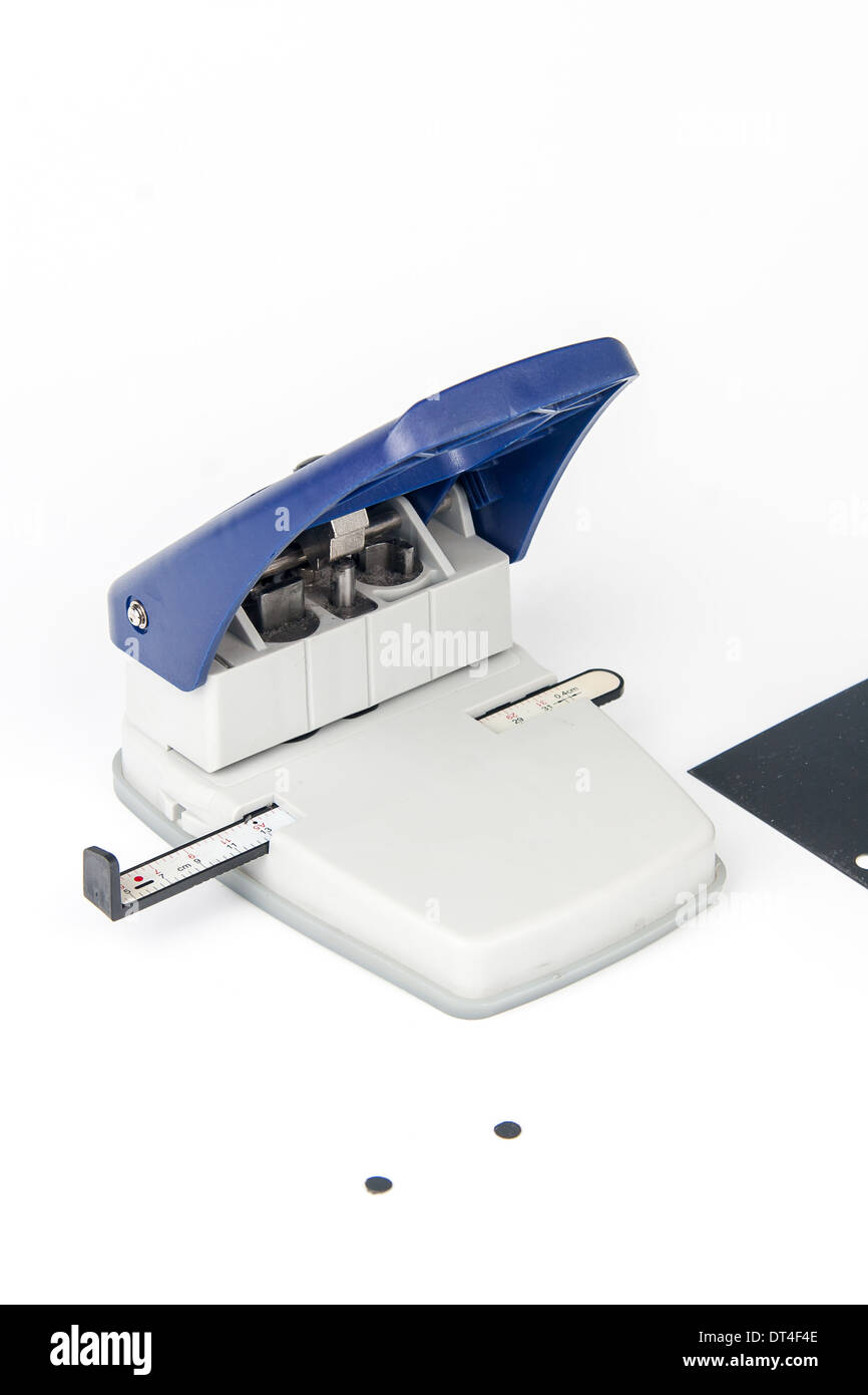 Office Puncher Unit isolated on white background Stock Photo - Alamy