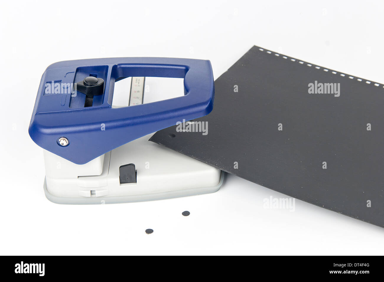 Office Puncher Unit isolated on white background Stock Photo - Alamy