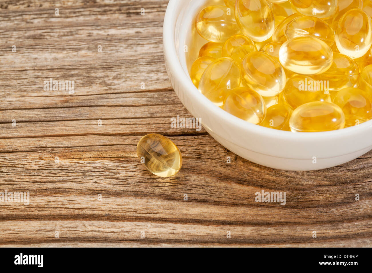 Small yellow capsules hi-res stock photography and images - Alamy