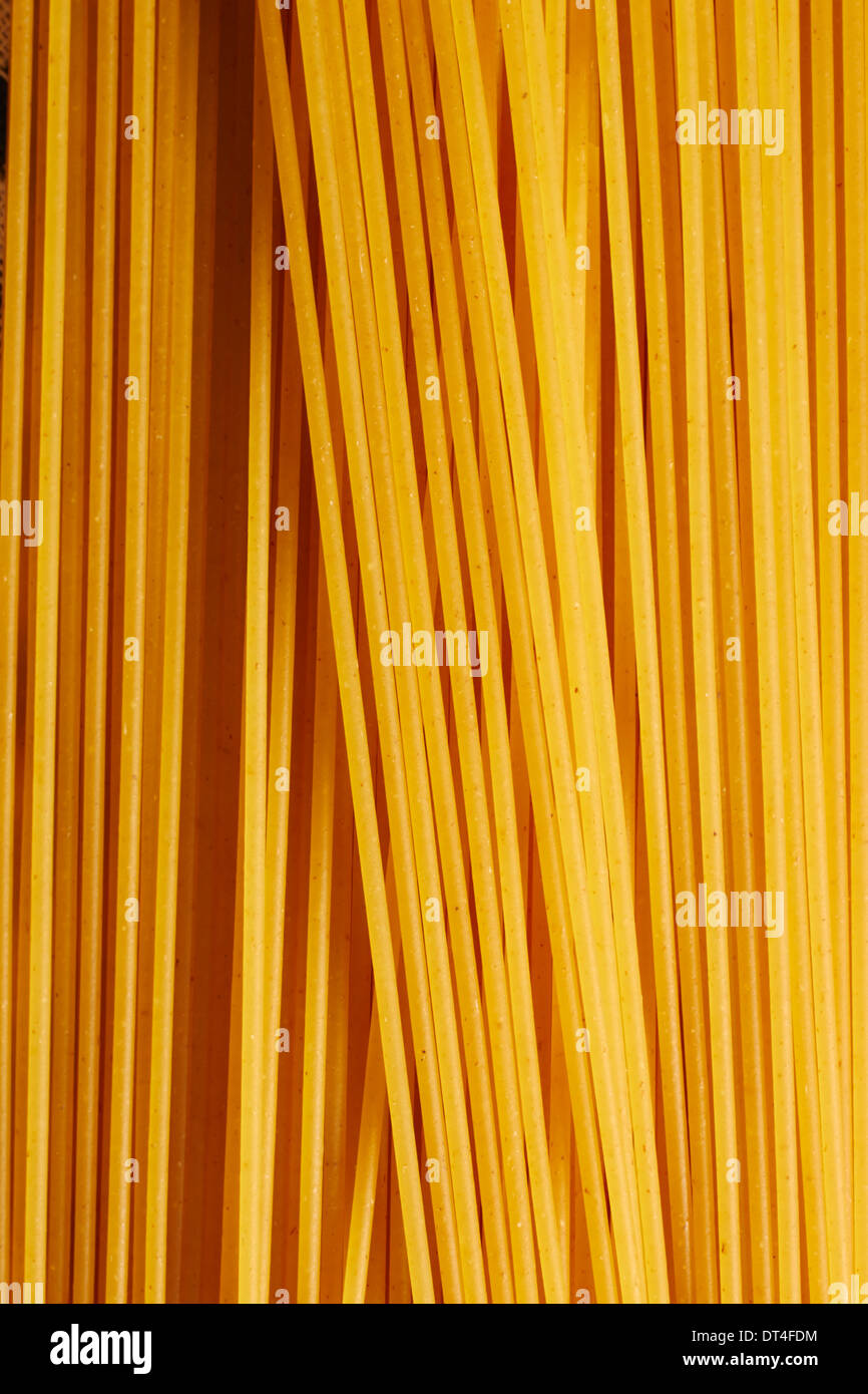 dry, uncooked, spaghetti pasta Stock Photo - Alamy