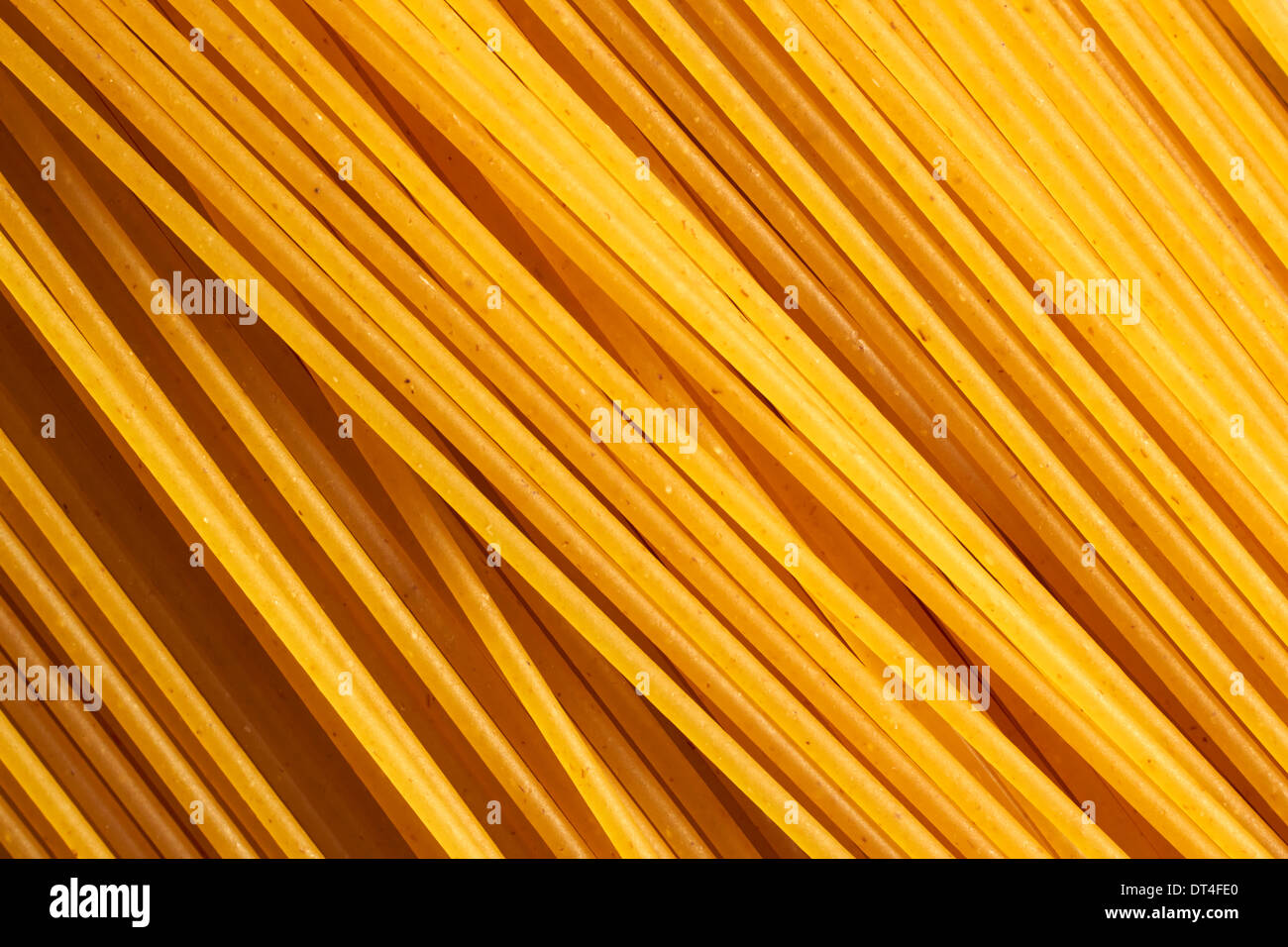 dry, uncooked, spaghetti pasta Stock Photo - Alamy