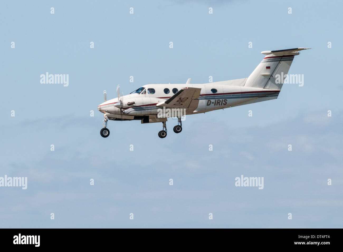German Beech 90 King Air private jet with landing gear down on final ...