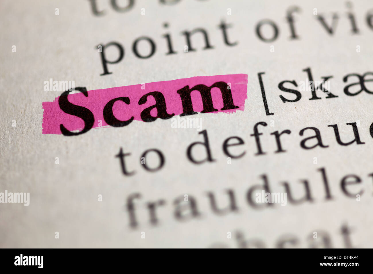 Fake Dictionary, Dictionary definition of the word Scam Stock Photo - Alamy