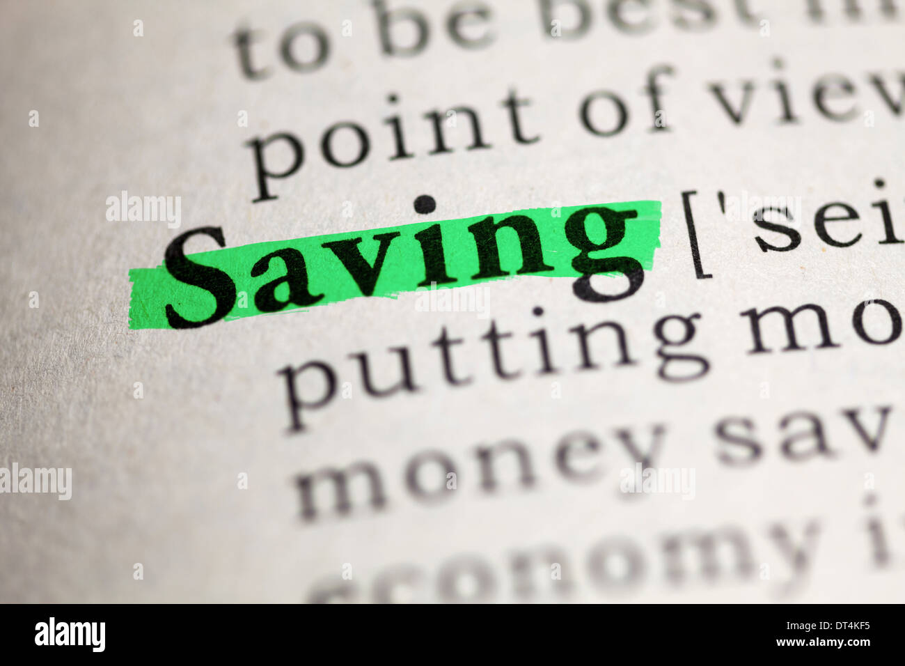 Fake Dictionary, Dictionary definition of the word Saving Stock Photo ...
