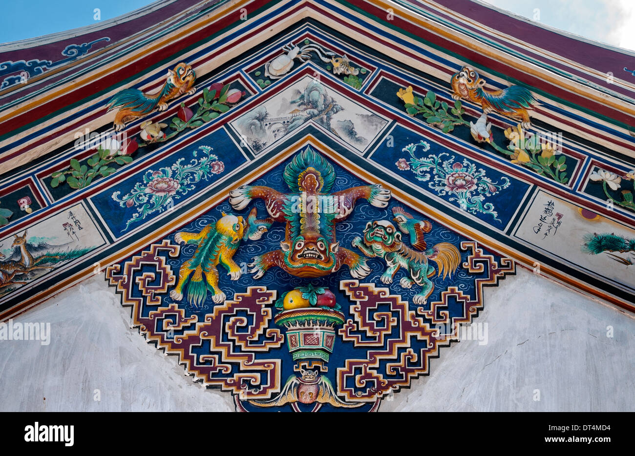 A detail of painted plasterwork decoration on the gable end of a ...