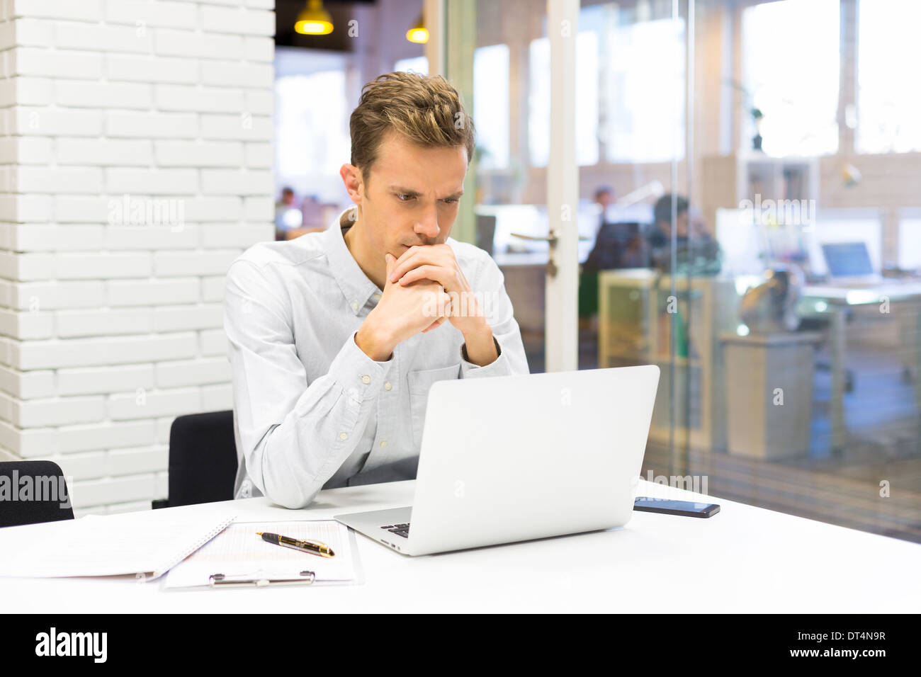 Male business computer desk start-up Stock Photo - Alamy