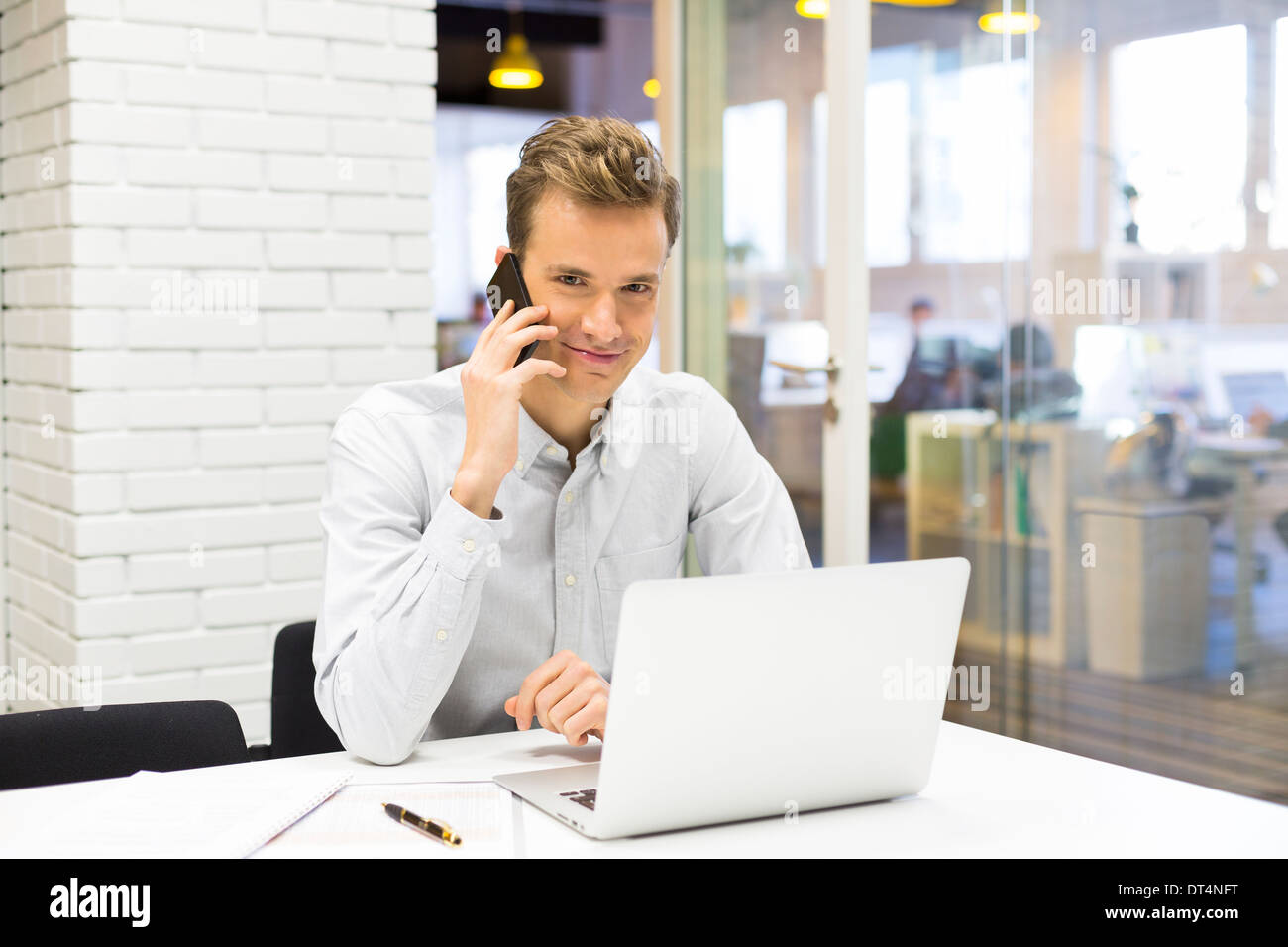 Desk phone office man hi-res stock photography and images - Alamy