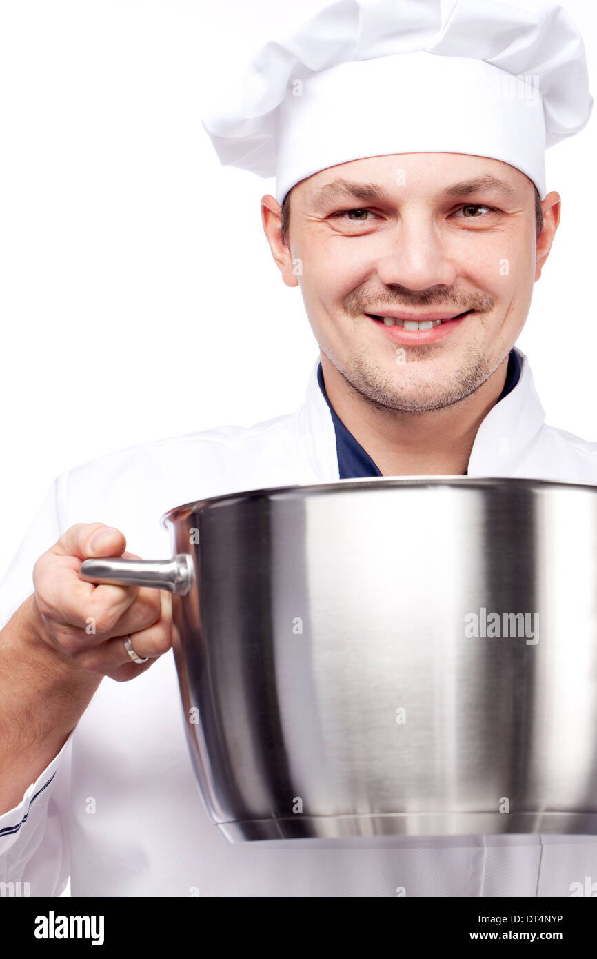 smiling chief holding metal pot in his hands isolated over white Stock ...
