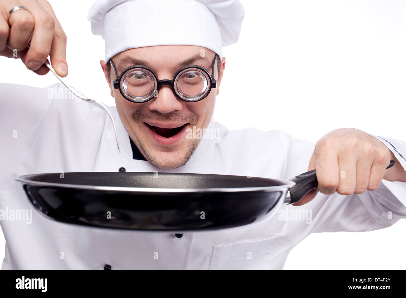 chef holding pan and fork isolated on white background Stock Photo - Alamy