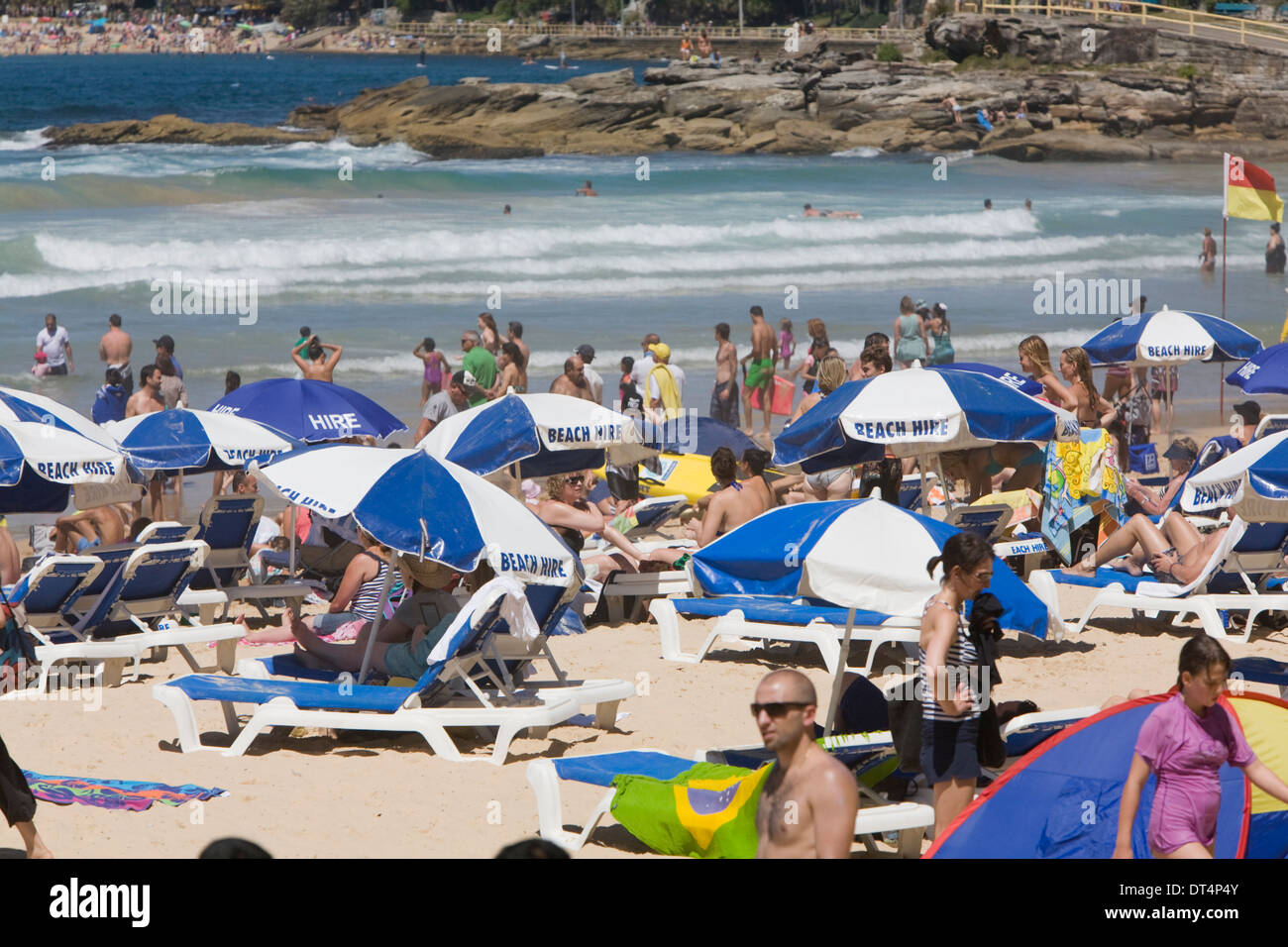 Crowded beach in summer parasols umbrellas hi-res stock photography and ...